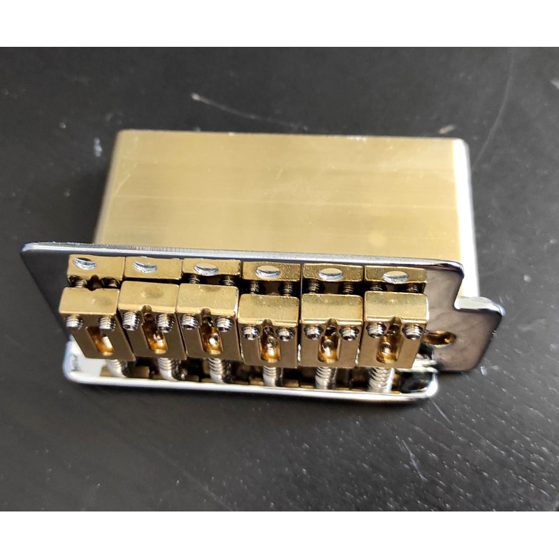 Chrome Strat tremolo solid brass block and 10.5mm brass saddles.
